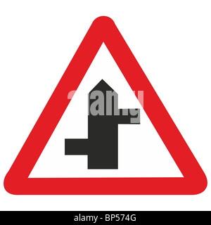 Staggered Junction road traffic sign Stock Photo - Alamy