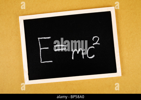 Einstein equation written on a blackboard Stock Photo - Alamy