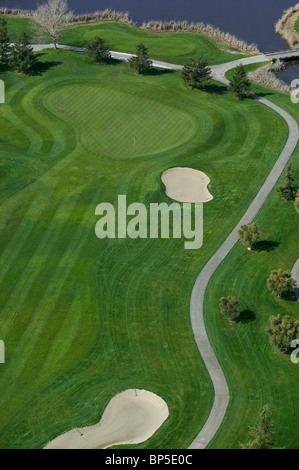 Aerial view of a green golf course at sunset Stock Photo - Alamy
