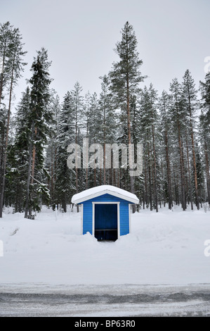Wooden bus stop in winter countryside in Lapland, Finland Stock Photo ...