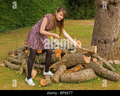 girl axe logs cutting Stock Photo - Alamy