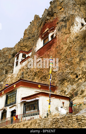 Tibetan Drak Yerpa Buddhist monastery on the cliff in Mountains of ...