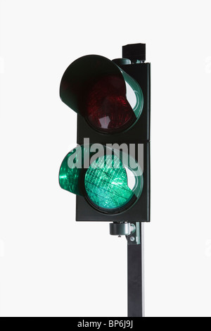 A vertical low angle shot of green unripe bananas on the tree Stock ...