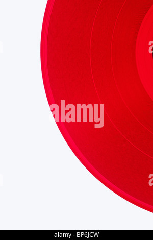 Red color vinyl record with white label on plywood background Stock ...