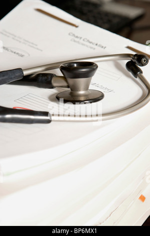 Stethoscope on top of Chart Stock Photo - Alamy