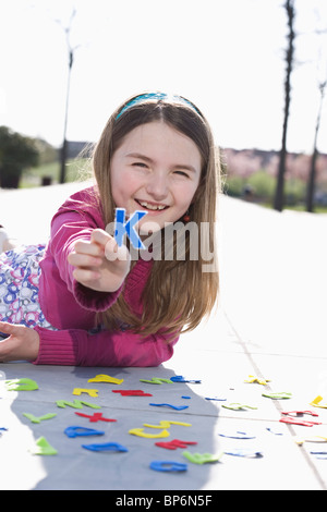 letter U spelling by girl's hand in American Sign Language (ASL) on ...