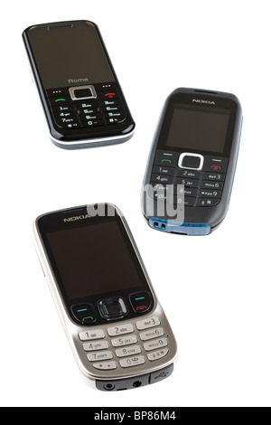 Three mobile phone handsets Stock Photo - Alamy