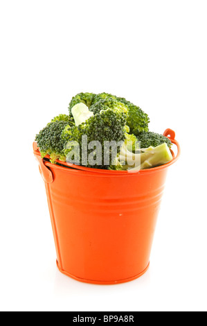 Orange metal buckete full with fresh broccoli Stock Photo - Alamy
