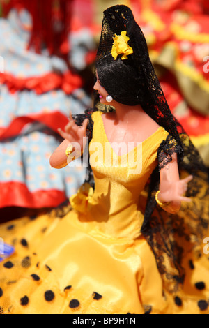 Woman traditional Spanish Flamenco dancer dancing in a red dress with a ...