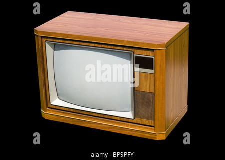 Old style retro tube TV with frequency knobs and wooden style casing ...