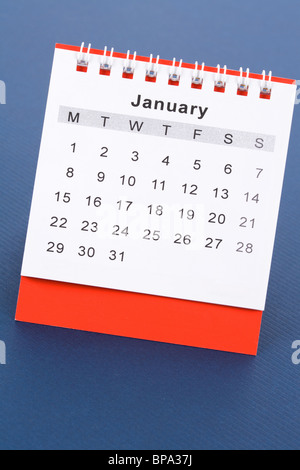 Calendar January close up with blue background Stock Photo - Alamy