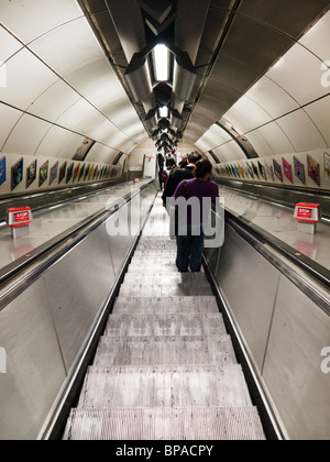 Travelling down escalator at London Bridge Underground station Stock ...