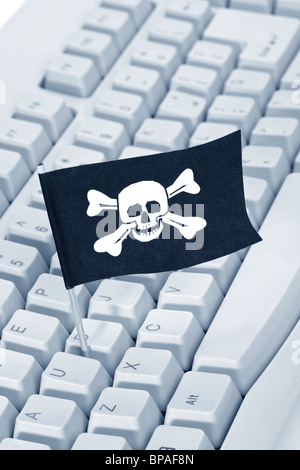 Pirate Flag and Computer Keyboard, concept of Computer Hacker Stock ...