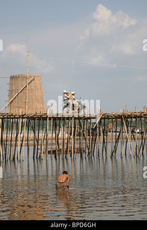 Cambodia, Kampong (Kompong) Cham, Koh Paen; hand built bamboo bridge ...