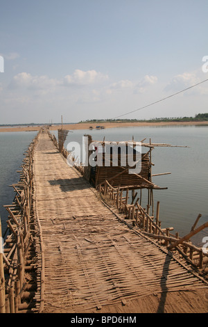 Cambodia, Kampong (Kompong) Cham, Koh Paen; hand built bamboo bridge ...