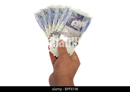 Twenty pound notes in a fan shape on a table Stock Photo - Alamy