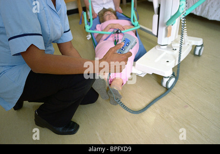 MOVING AND HANDLING - NURSES ASSISTING PATIENT TO WALK USING HANDLING ...