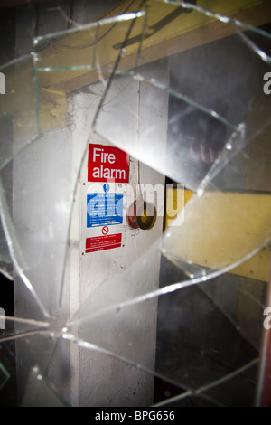 In case of fire break glass, shattered pane in front of fire sign Stock ...