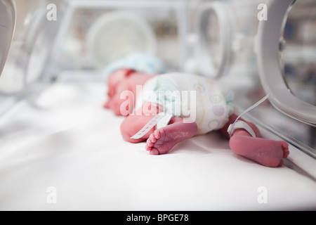 Newborn baby covered in vernix getting a nappy Stock Photo: 31095176 ...