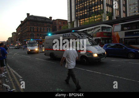 Rangers fans and Police vans and police in riot gear in Manchester for ...
