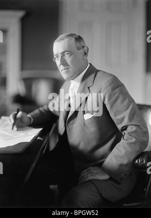 A half-length portrait of Woodrow Wilson, facing right, showcasing his ...