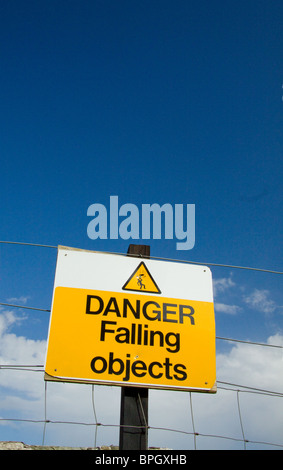 Danger falling objects warning sign label isolated, black triangle over ...