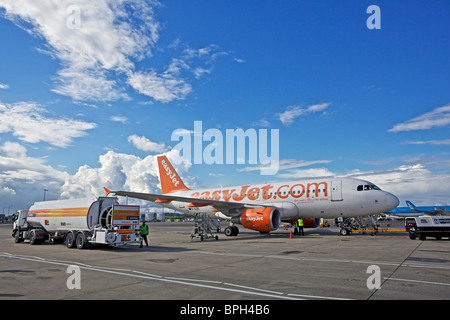 Easyjet plane refueling on the tarmac at Edinburgh airport, Scotland ...