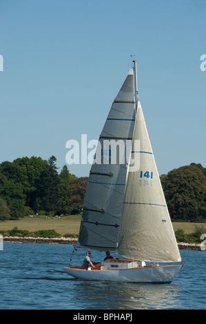 Sailing small sailboat under sail action wake Stock Photo: 11231078 - Alamy