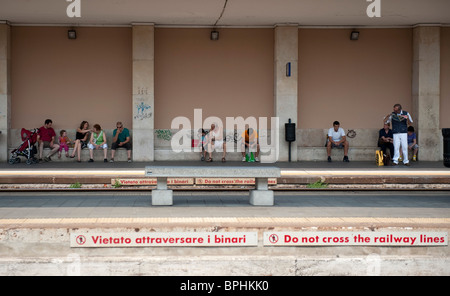 On a hot summer day, people wait to enter the Zatoka swimming pool ...