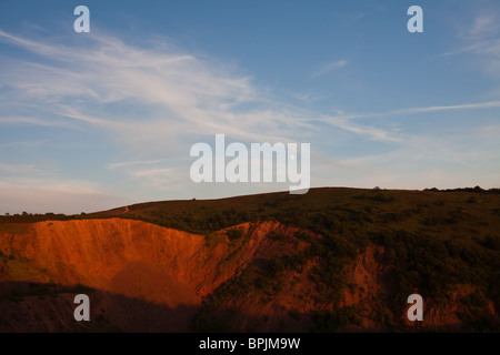 Triscombe Quarry on the Quantocks, Somerset at sunset. The Moon can ...