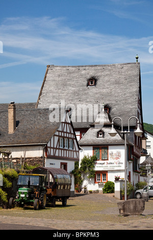 Traditional timber framed German village house with shutters and window ...