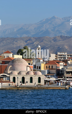 Traditional buildings and Turkish baths at the old port of Chania ...