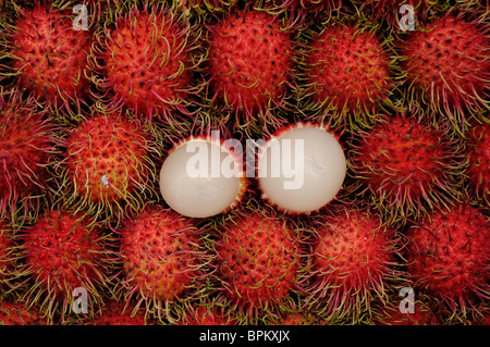 Stack of Rambutan fruit, Friut market, Bangkok, Thailand Stock Photo ...