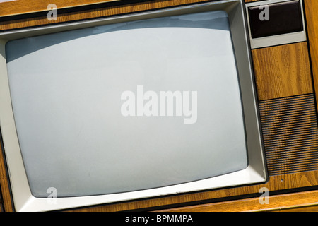 Old style retro tube TV with frequency knobs and wooden style casing ...