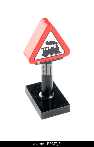 Plastic toy warning sign Stock Photo - Alamy