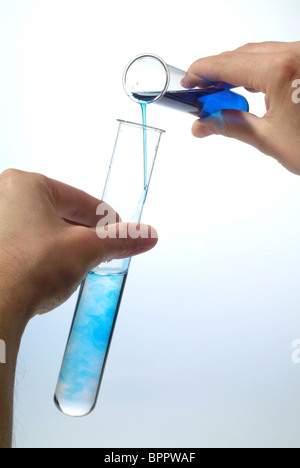 Two hands with chemical tubes in the laboratory on white Stock Photo ...