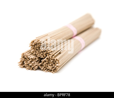 Bundles of buckwheat soba noodles. Isolated on white Stock Photo - Alamy