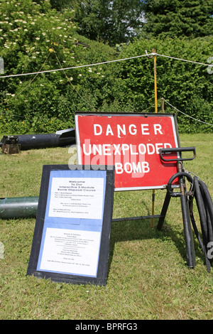Warning notice sign Danger Unexploded ordnance on this beach it may ...