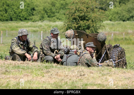 WW2 Reenactment members of the SS taking part in a mock battle weekend ...