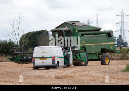 repairing a combine harvester Stock Photo - Alamy