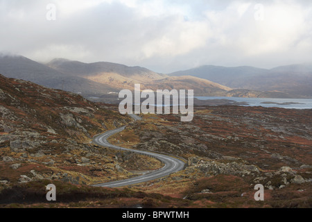 A winding road cuts through the barren terrain of Faryab Province ...