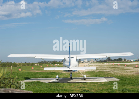 Small airplane cockpit with rear-view mirror Stock Photo - Alamy