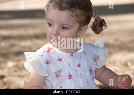 baby toddler child pose engaging face expression Stock Photo - Alamy