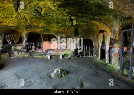 Caves below Commarque castle in the Dordogne France where people would ...