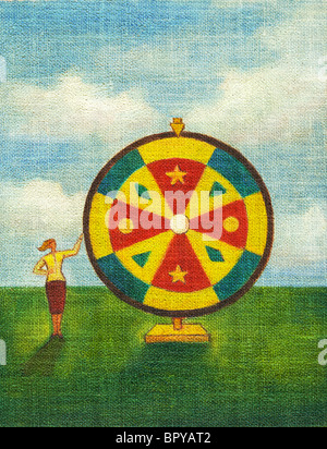 Spinning fortune wheel Stock Photo - Alamy