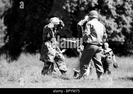 British and American troops over run a Waffen SS unit in Normandy 1944 ...