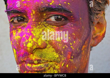 Young man in holi colors. holi is a festival of India. It is festival ...