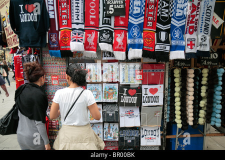 Tacky souvenirs for tourists on sale next toe ancient roman forum ruins ...