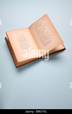 Open old vintage book on wooden table Stock Photo - Alamy