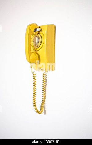 Vintage telephone - Yellow Stock Photo - Alamy